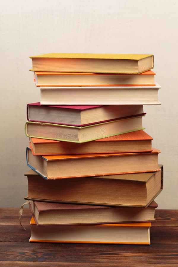 Stack of Books on a Wooden Dest .Education Stock Image - Image of read ...
