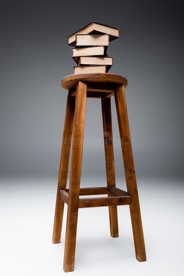 Stack of Books on Wooden Stool Stock Image - Image of business ...