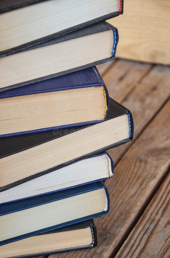 Big Books. Stack of Books on a Wooden Table Stock Image - Image of ...