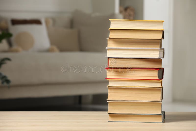 Stack of Books on Wooden Table in Living Room, Space for Text. Home ...
