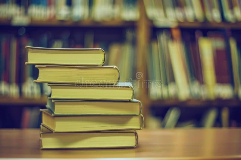 Stack of Books on Wooden Table Stock Photo - Image of books, textbooks ...