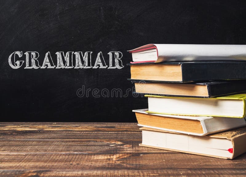A Stack of Books with the Word Grammar Written on Top Stock Image ...
