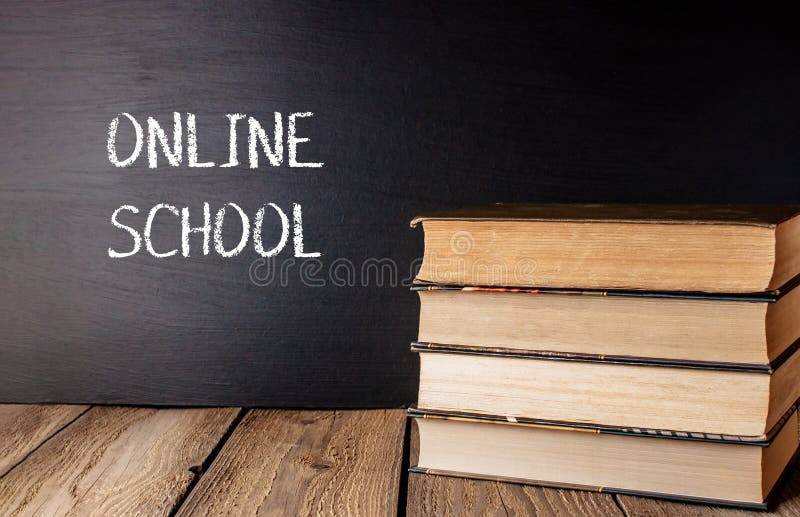 Stack of Books with the Word Online School Written on a Chalkboard ...