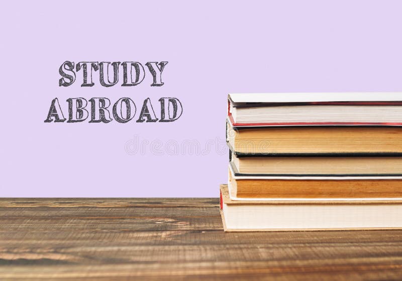 A Stack of Books with the Word Study Abroad Written on Top Stock Image ...
