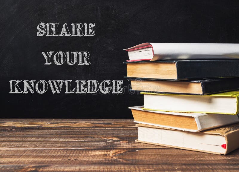 Stack of Books with the Words Share Your Knowledg" Written on Top Stock ...