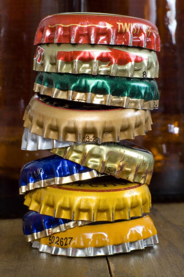 A stack of bottle caps stock photo. Image of liquid, close - 15188142