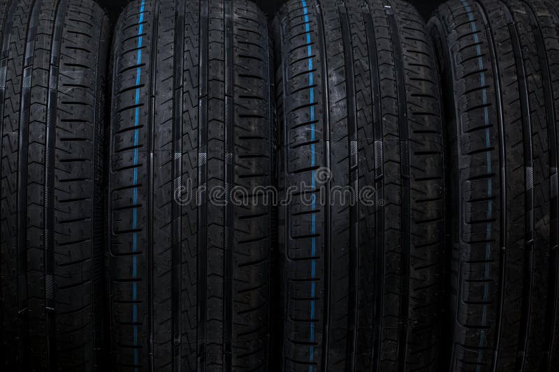Stack of Brand New High Performance Car Tires Stock Photo - Image of ...