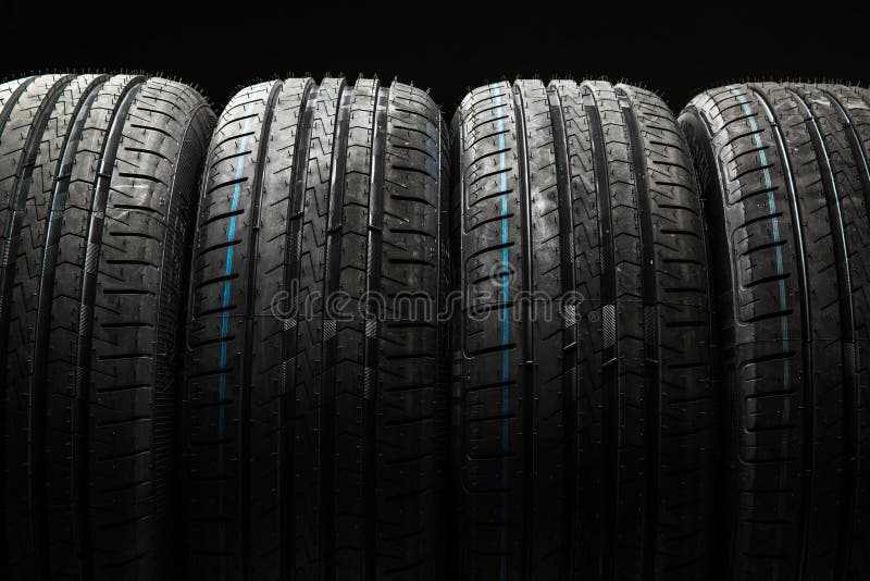 Stack of Brand New High Performance Car Tires Stock Photo - Image of ...