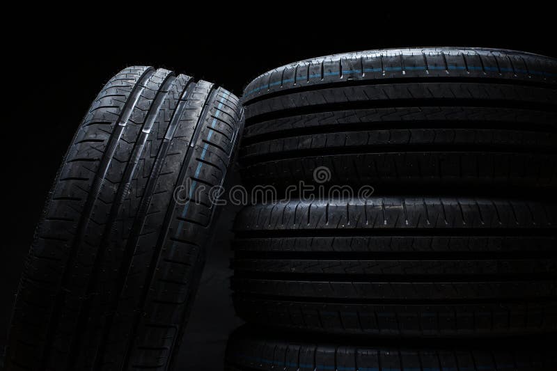Stack of Brand New High Performance Car Tires Stock Photo - Image of ...