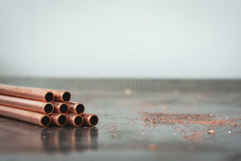 Stack of brass pipes. stock image. Image of hose, backdrop - 138425017