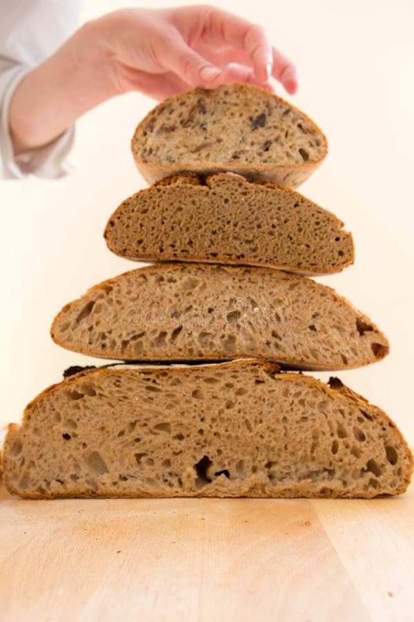 Stack of bread stock image. Image of stack, held, black - 50781247