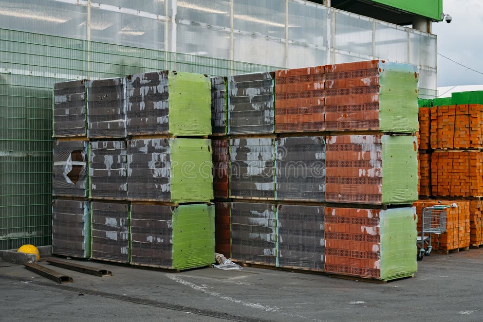 Stack of bricks packs stock photo. Image of architectural - 155546954