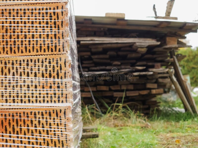 Stack of Bricks in a Yard, Concept Construction. Stock Image - Image of ...