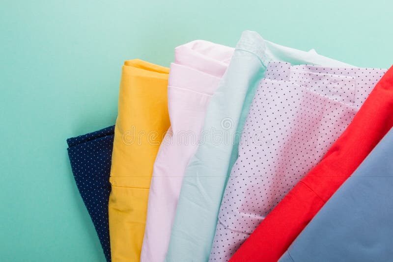 Stack of Bright Female Trousers. Folded Colorful Pants and Jeans Stock ...