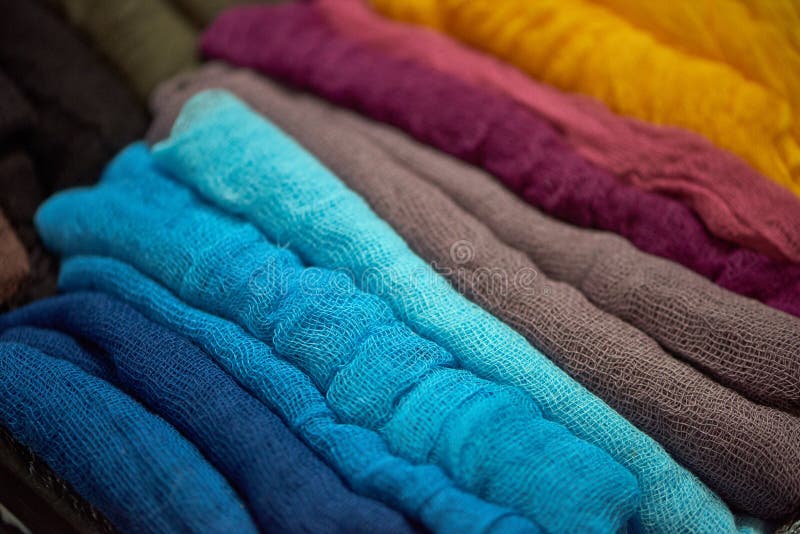 A Stack of Bright Gauze Fabrics of Different Colors. Fabric Texture ...