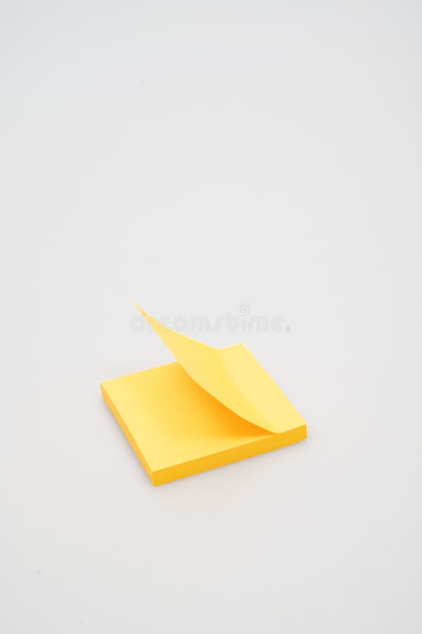 A Stack of Bright Yellow Sticky Notes with a Corner Peeled Back. Stock ...