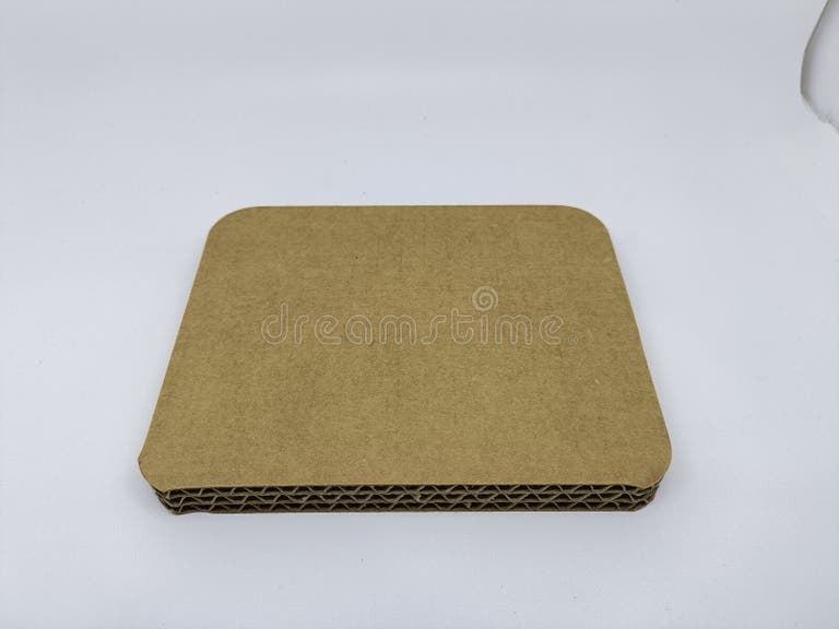 Stack of Brown Corrugated Cardboard Sheets with Rounded Edges Placed on ...