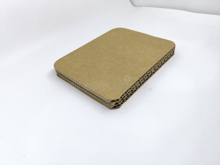 Stack of Brown Corrugated Cardboard Sheets with Rounded Edges Placed on ...