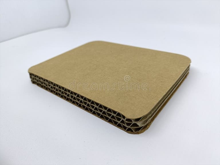 Stack of Brown Corrugated Cardboard Sheets with Rounded Edges Placed on ...