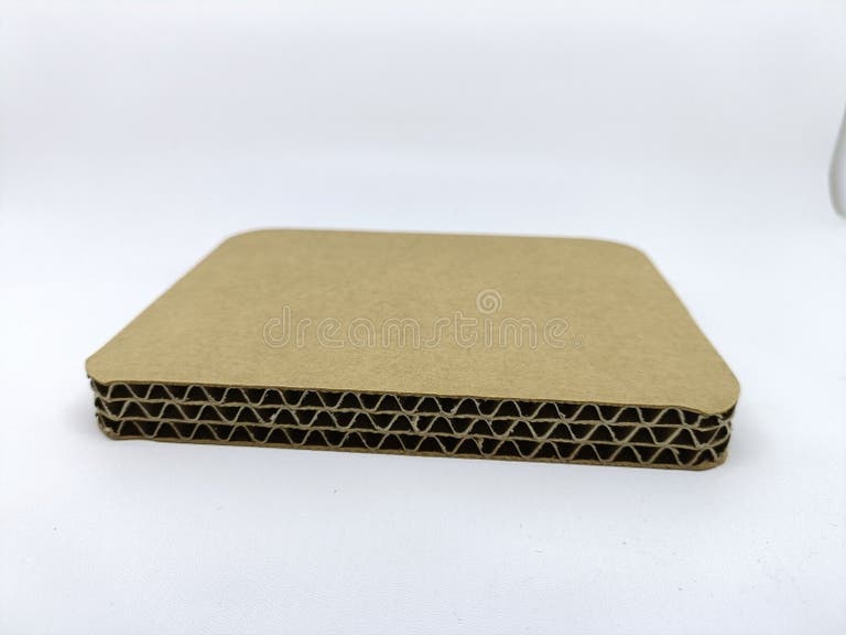 Stack of Brown Corrugated Cardboard Sheets with Rounded Edges Placed on ...