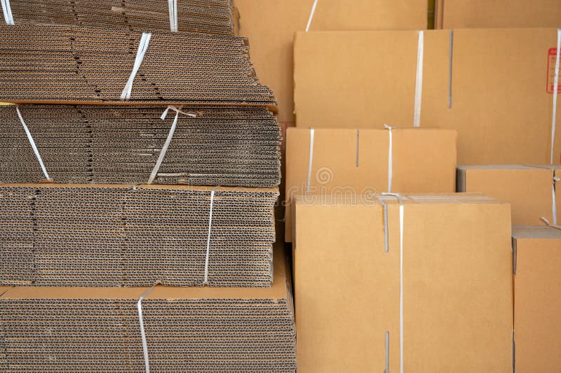 Stack of Brown Folded Cardboard Boxes Tied Stock Photo - Image of ...