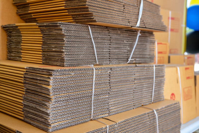 Stack of Brown Folded Cardboard Boxes Tied Stock Photo - Image of ...