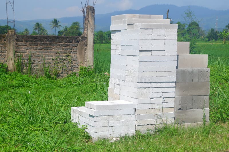 Stack of Building Blocks in Rural Landscape with Greenery Stock Image ...