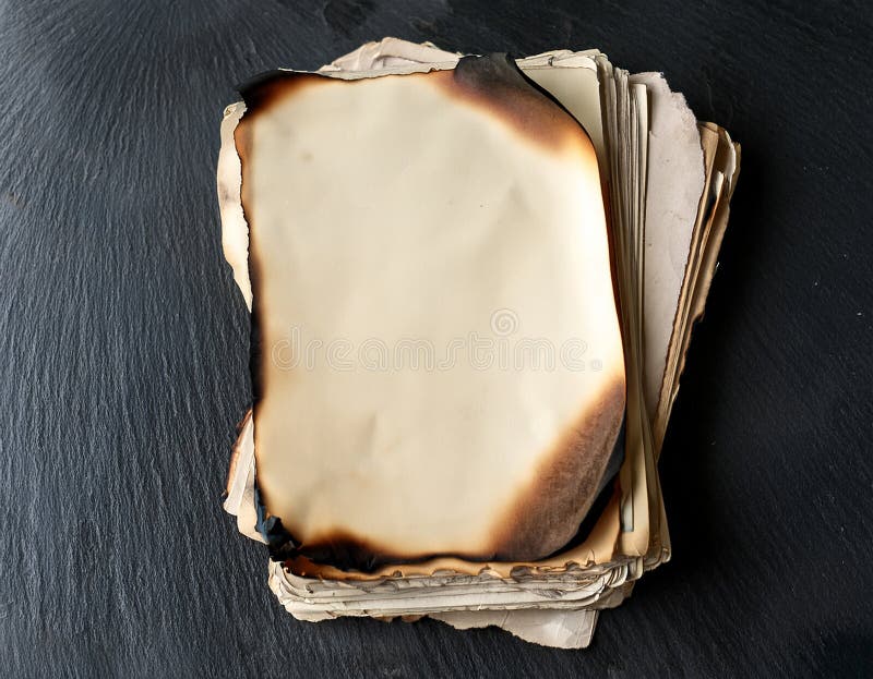 A Stack of Burnt Edges Paper Creating a Vintage Aesthetic Placed on a ...