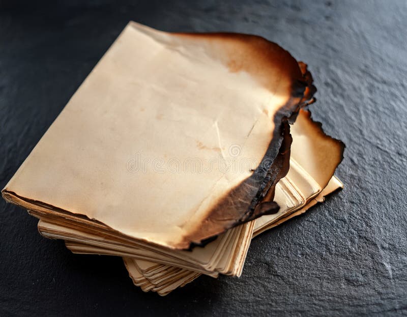 A Stack of Burnt Edges Paper Creating a Vintage Aesthetic Placed on a ...