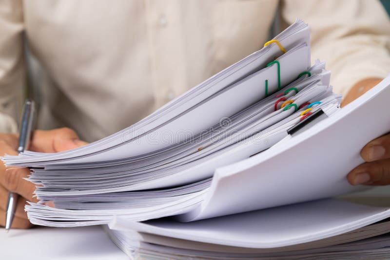 Stack of business paper stock image. Image of table - 185580001