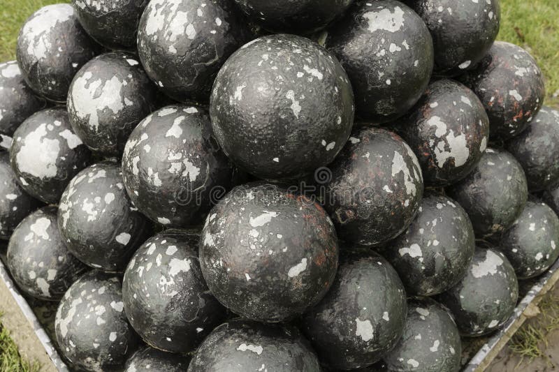 A stack of cannonballs stock photo. Image of large, cannonballs - 277298094