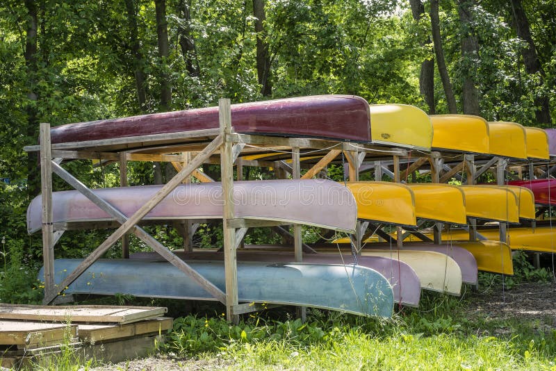 Stack of Canoes stock photo. Image of adventure, canoe - 41779438