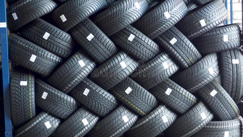 Tire Stack Background. Car Tires Stacked One on Top of Another in a ...