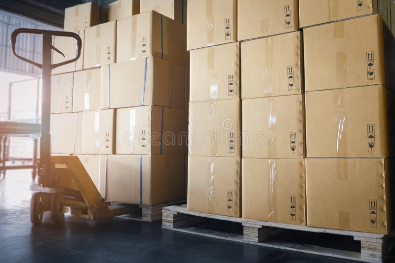 Interior of Storage Warehouse. Stacked of Package Boxes on Wooden ...