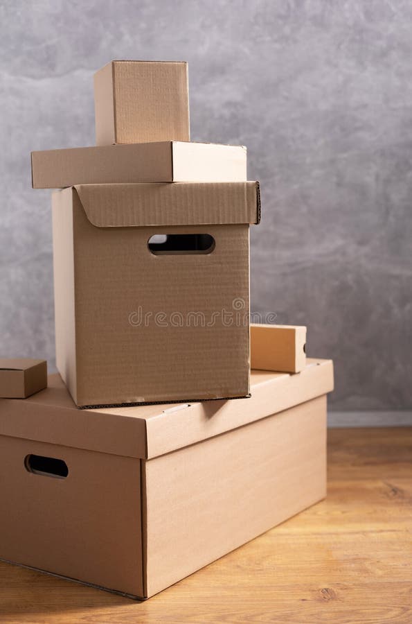 Stack of Cardboard Box on Floor. Cardboard Boxes for Moving To New Home ...