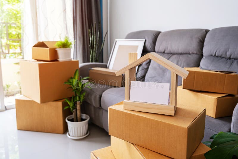 Stack of Cardboard Boxes in Living Room at New House Stock Image ...