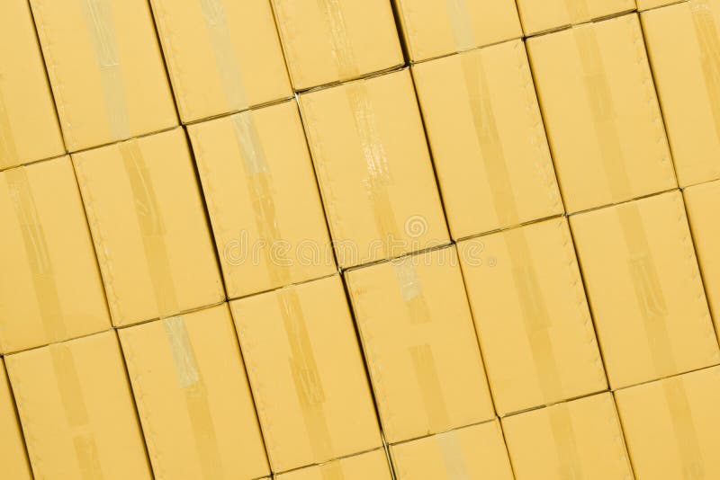 Stack of Cardboard Boxes in My Office, Yellow Box Background Stock ...