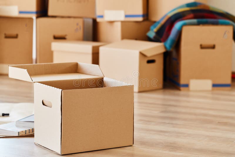 Stack of Cardboard Boxes in Room of New Home Stock Image - Image of ...