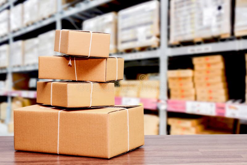 Stack of Cardboard Boxes on Warehouse Background Stock Photo - Image of ...