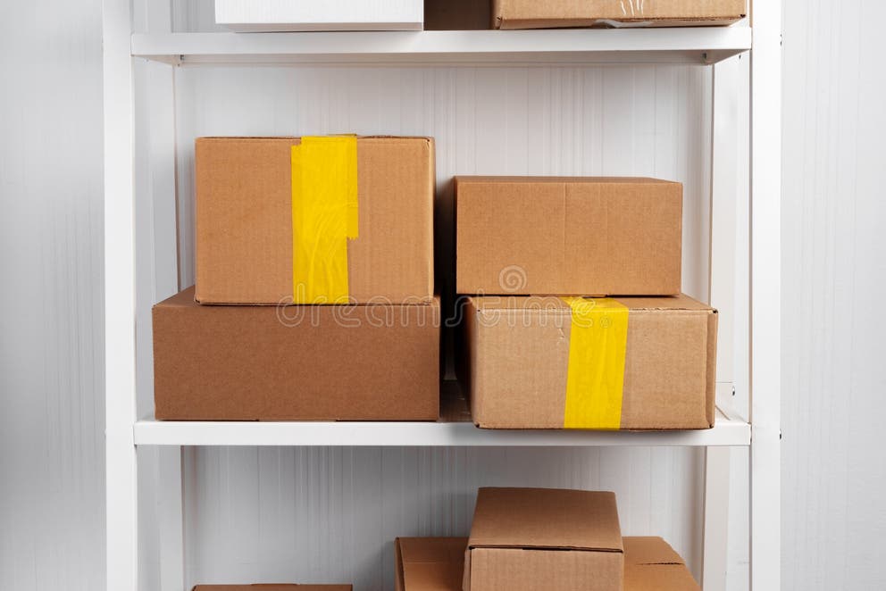 Stack of Cardboard Package Boxes on Wooden Rack Stock Image - Image of ...