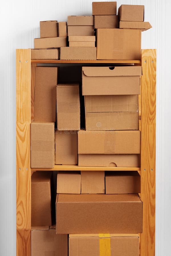 Stack of Cardboard Package Boxes on Wooden Rack Stock Image - Image of ...