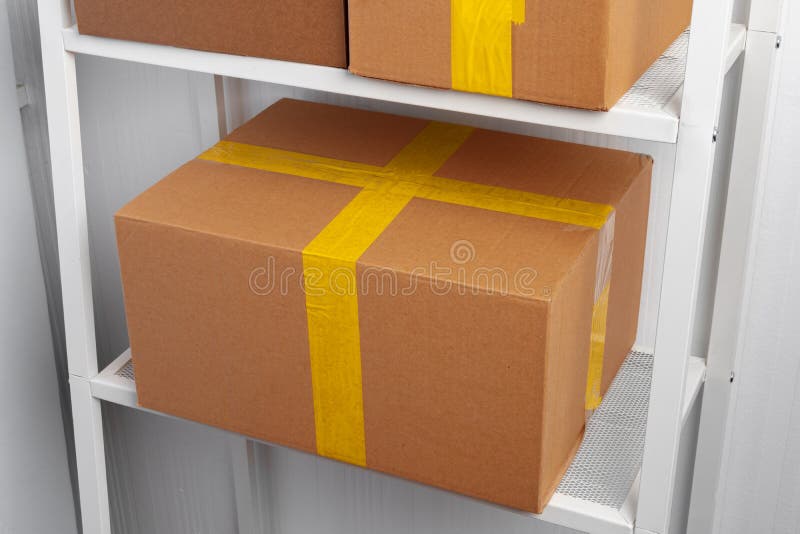 Stack of Cardboard Package Boxes on Wooden Rack Stock Photo - Image of ...