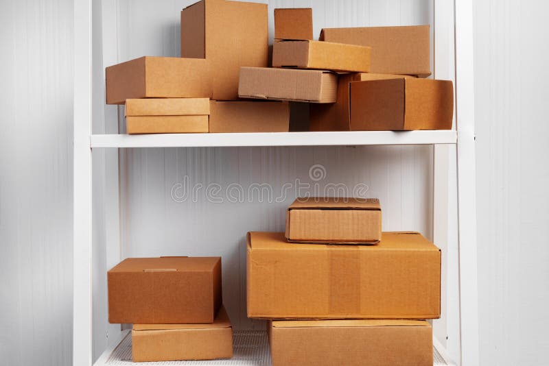 Stack of Cardboard Package Boxes on Wooden Rack Stock Photo - Image of ...