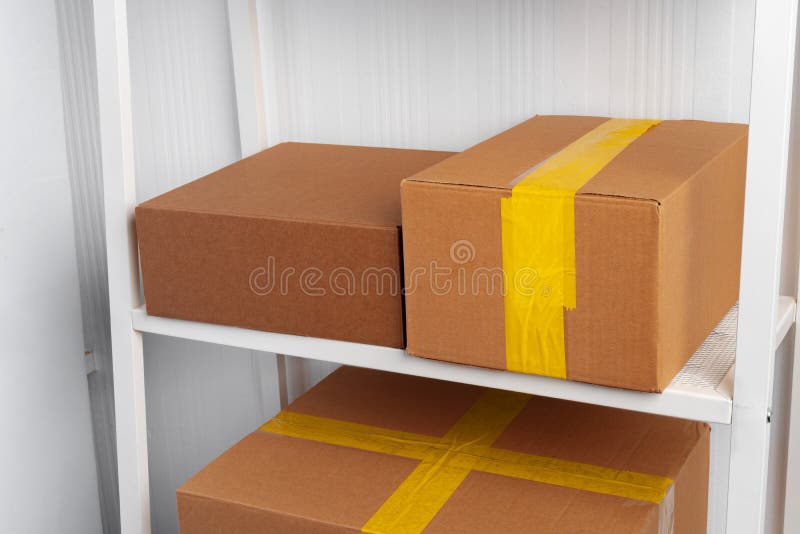 Stack of Cardboard Package Boxes on Wooden Rack Stock Photo - Image of ...