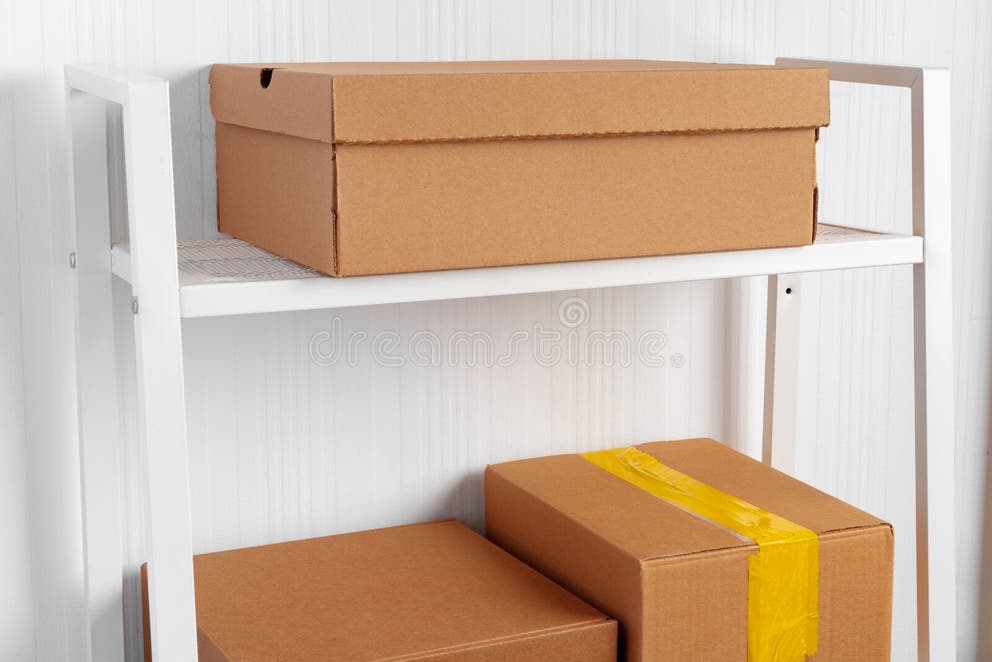 Stack of Cardboard Package Boxes on Wooden Rack Stock Photo - Image of ...