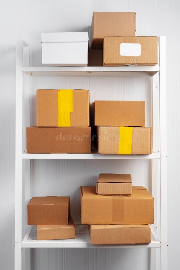 Stack of Cardboard Package Boxes on Wooden Rack Stock Image - Image of ...
