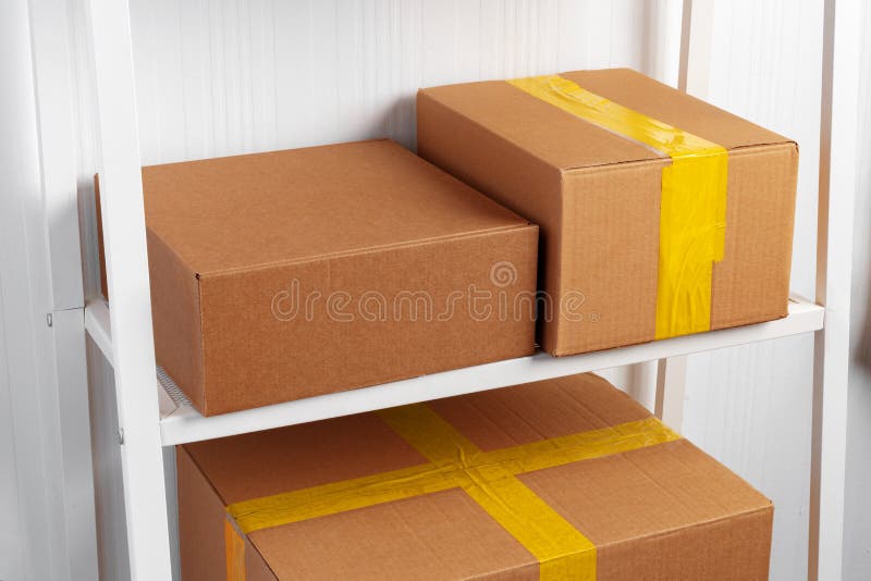 Stack of Cardboard Package Boxes on Wooden Rack Stock Image - Image of ...