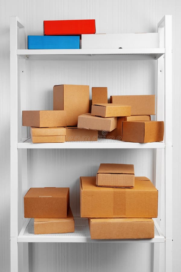 Stack of Cardboard Package Boxes on Wooden Rack Stock Photo - Image of ...