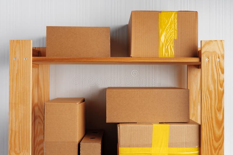 Stack of Cardboard Package Boxes on Wooden Rack Stock Photo - Image of ...
