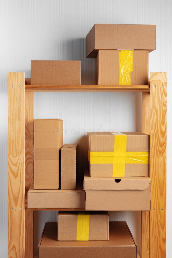 Stack of Cardboard Package Boxes on Wooden Rack Stock Photo - Image of ...
